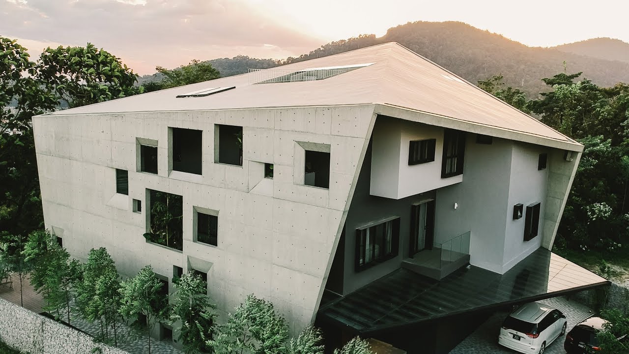 Angular concrete shell encloses interior gardens at The Window House by ...